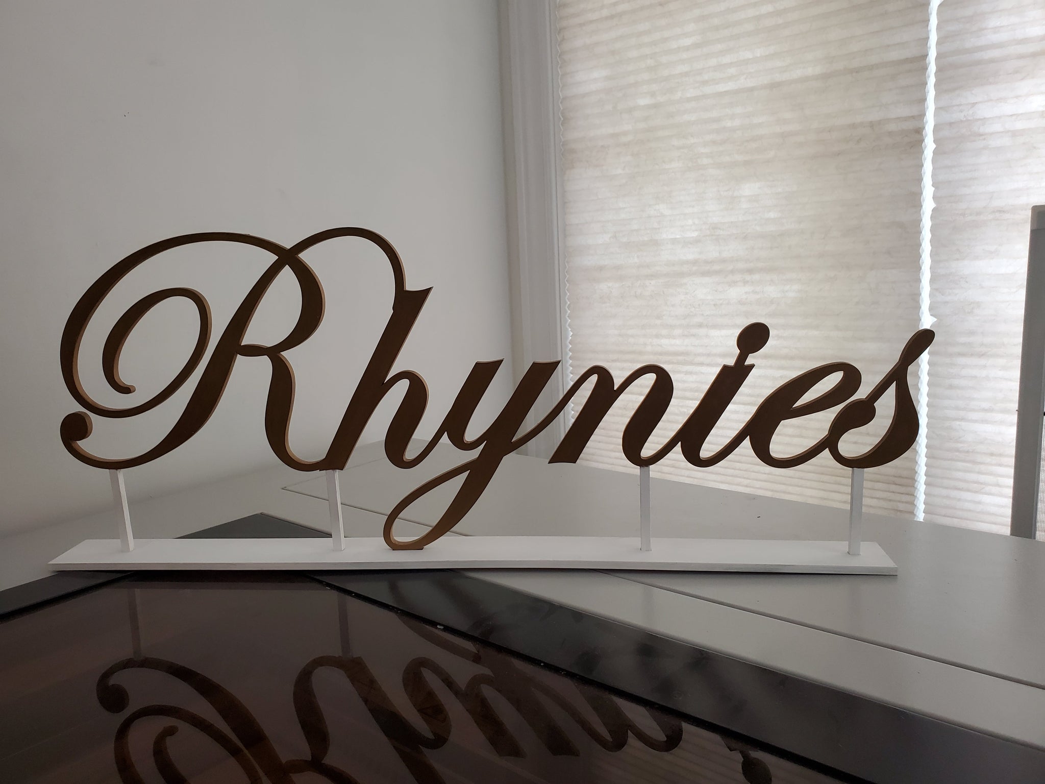 Stilted self standing signs – Char & Beam